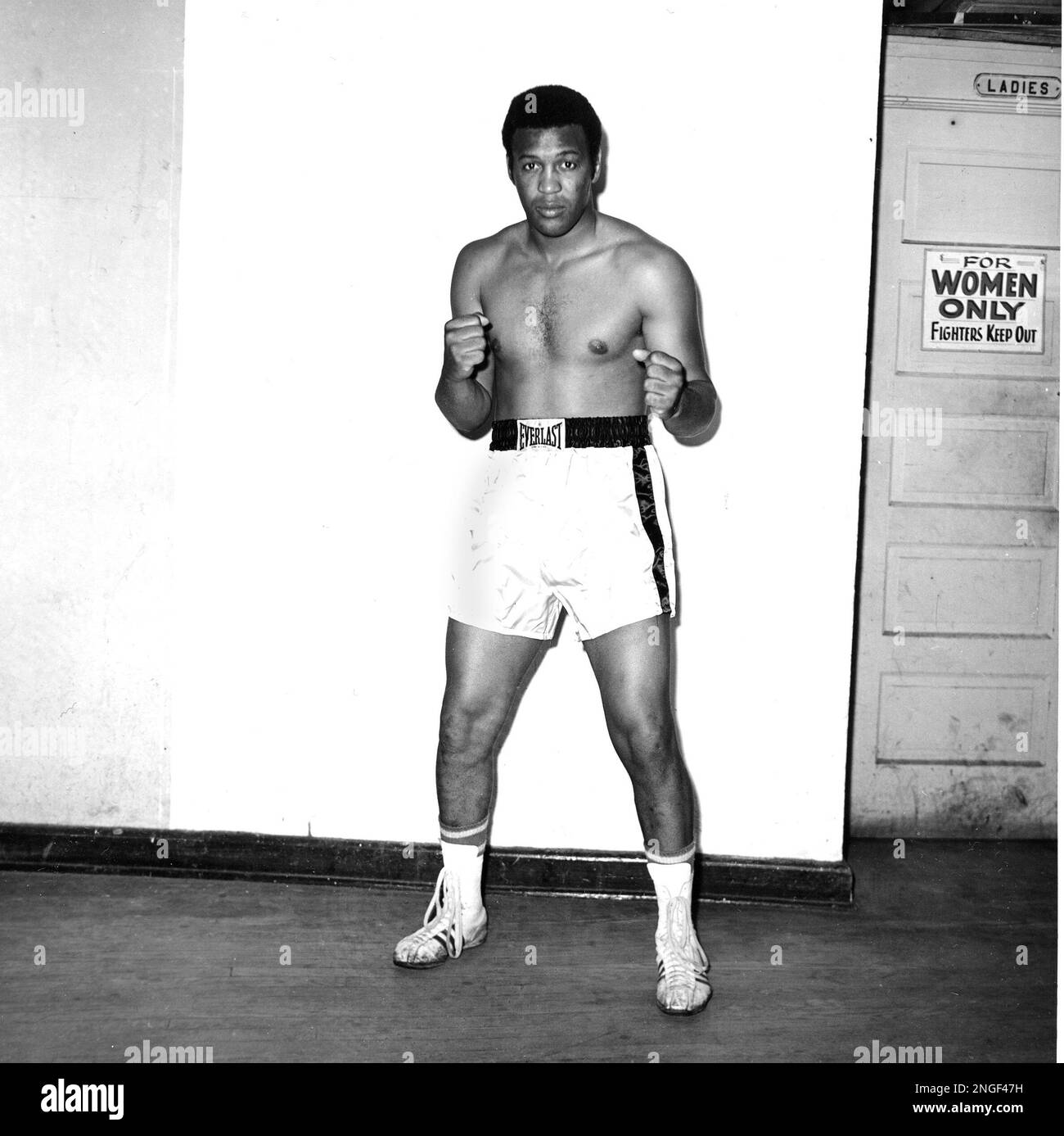 Boxer Jimmy Ellis is seen in this posed action shot at training ...