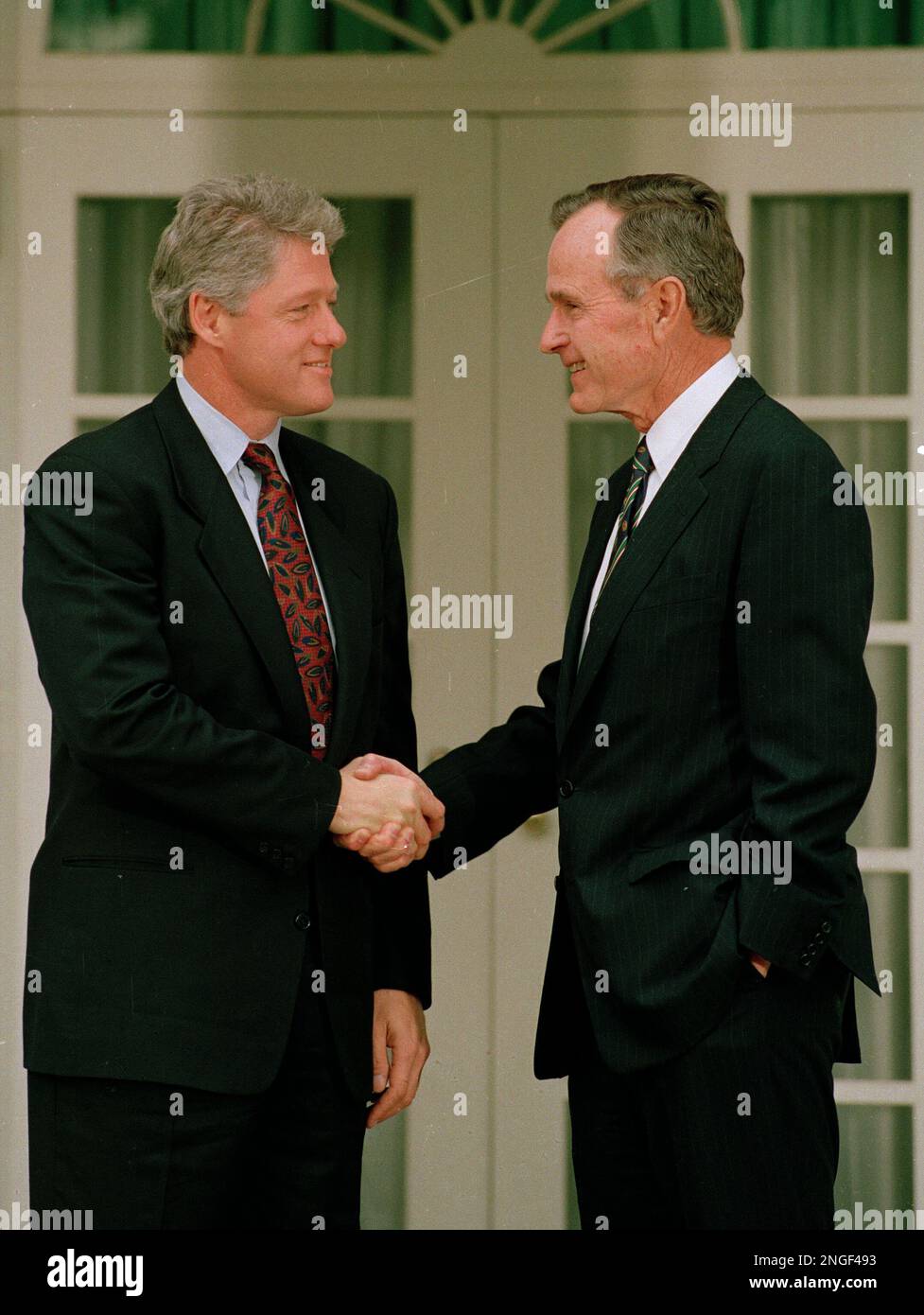 U.S. President George Bush, right, shakes hands with President-elect ...