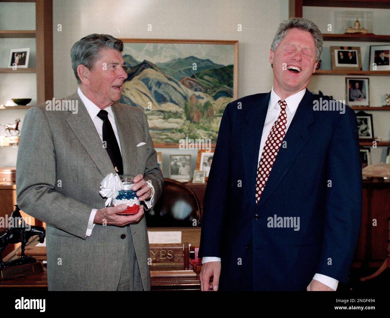 U.S. President Bill Clinton, right, reacts as former President Ronald ...