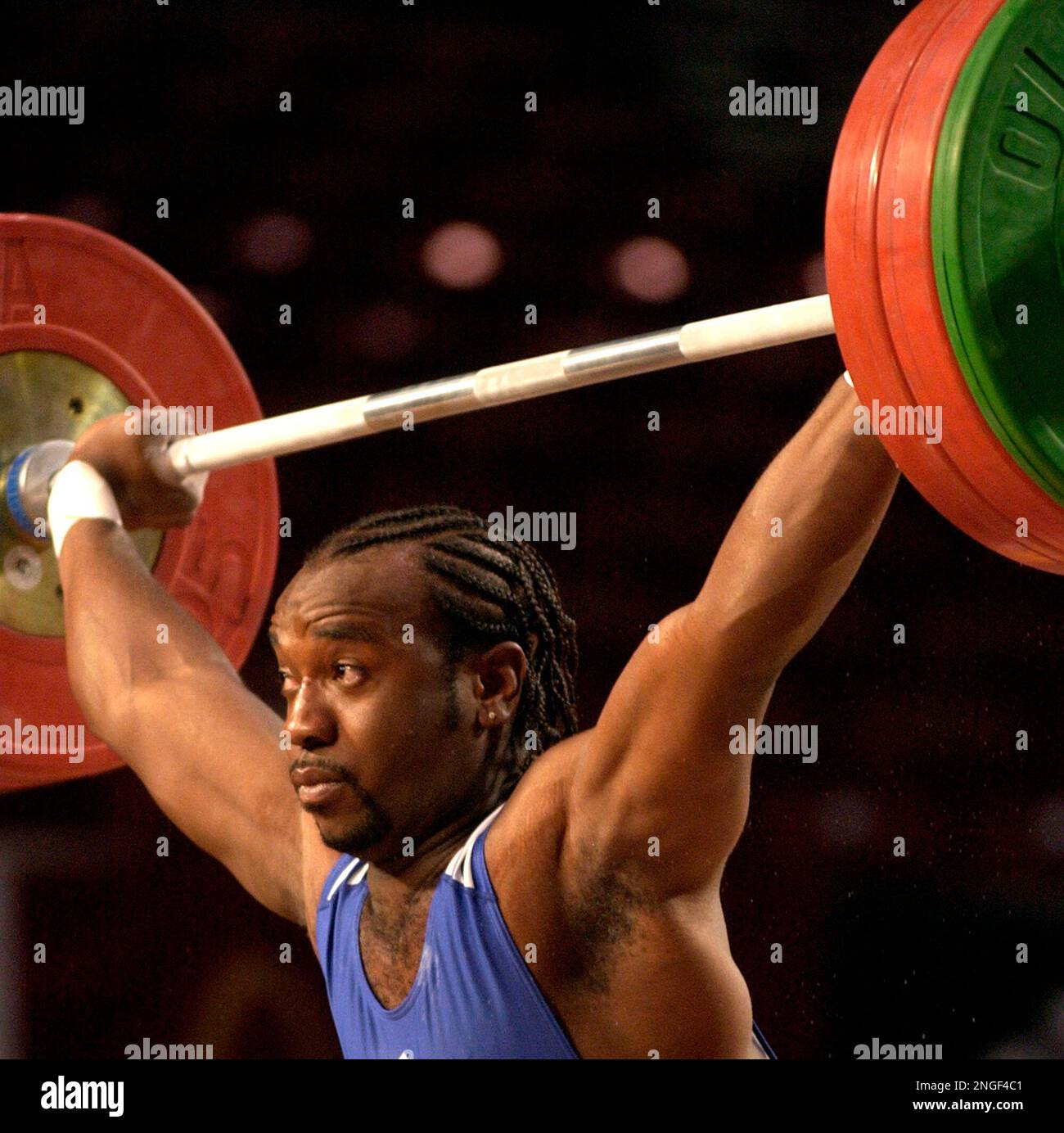 Oscar Chaplin III, of Savannah, Ga., lifts 150kg in the snatch event at ...