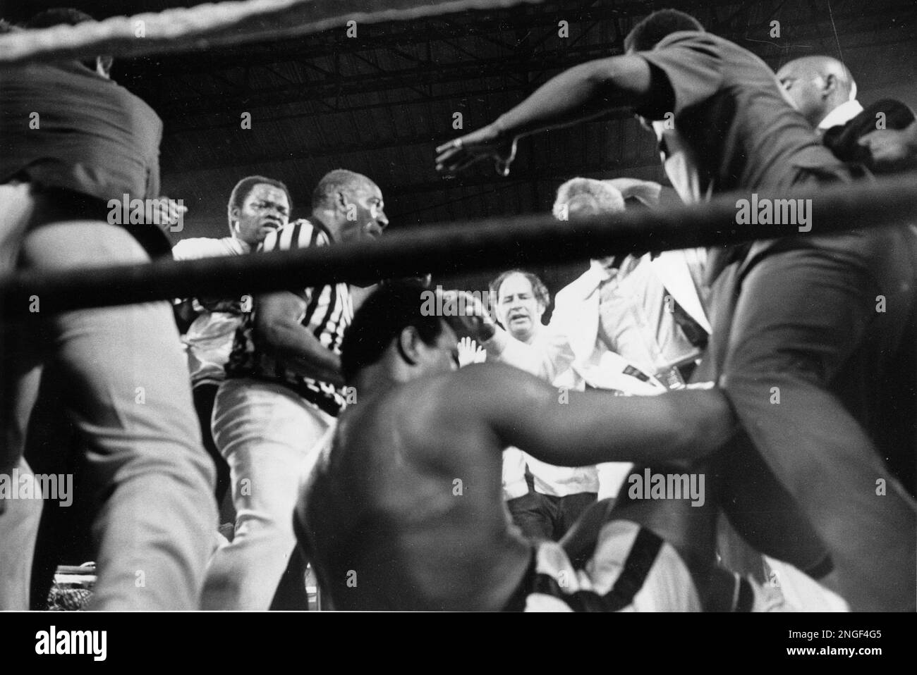 An exhausted Muhammad Ali falls to the canvas after knocking out ...