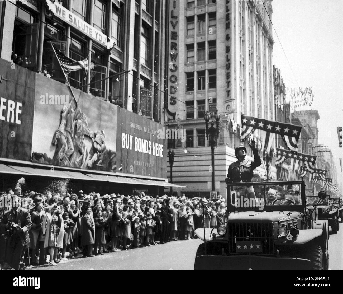 Gen. George S. Patton acknowledges the cheers of thousands who greeted ...