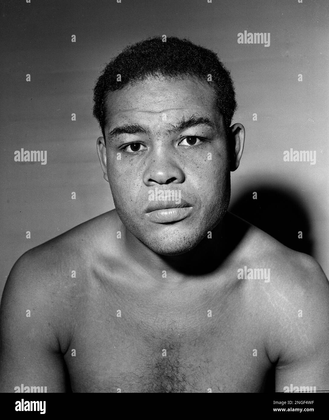 Heavyweight boxing champion Joe Louis is shown as he begins training ...