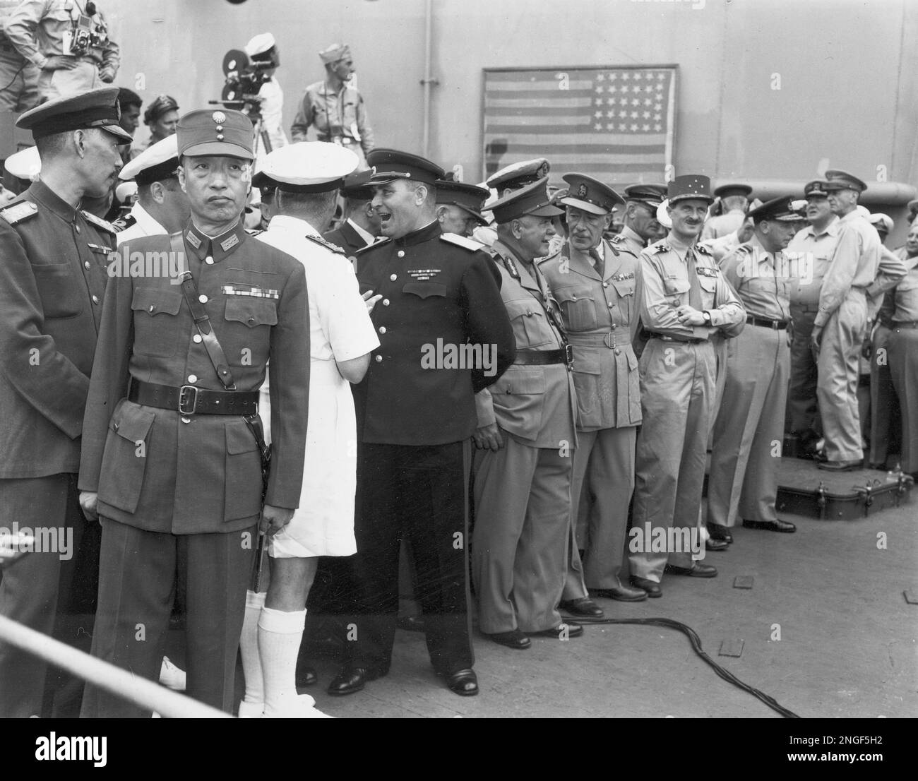 Allied officials and military personnel and Japanese representatives ...