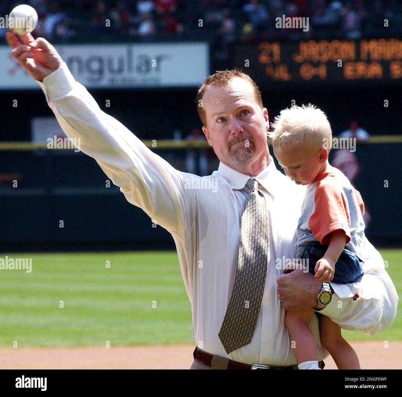 Mark McGwire, former St. Louis Cardinals slugger, throws out the ...