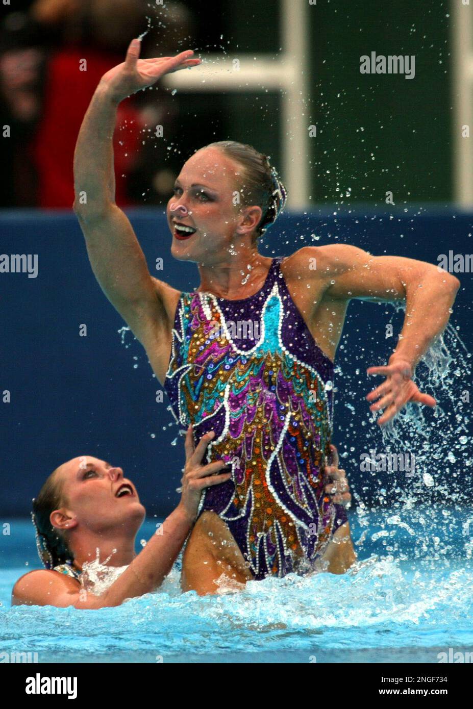 Alison Bartosik and Anna Kozlova from the United States perform their ...