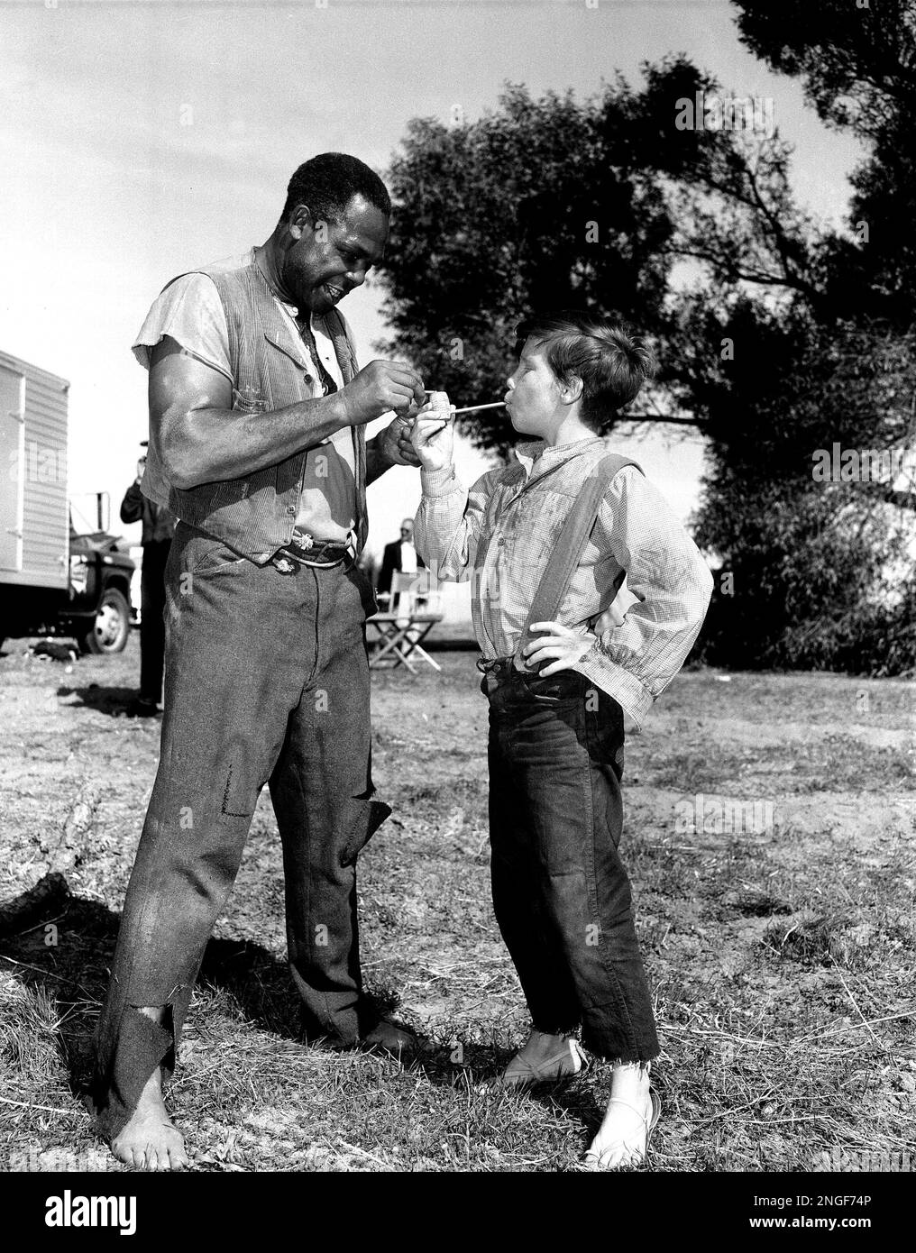 Light heavyweight boxing champion Archie Moore, left, portrays Jim in ...