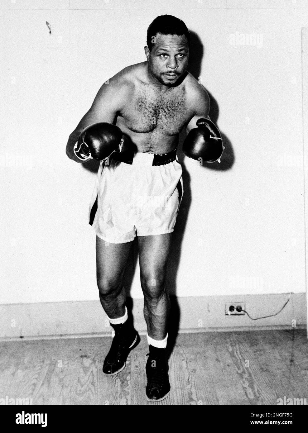 Light heavyweight boxer Archie Moore is shown in an action pose in 1955 ...