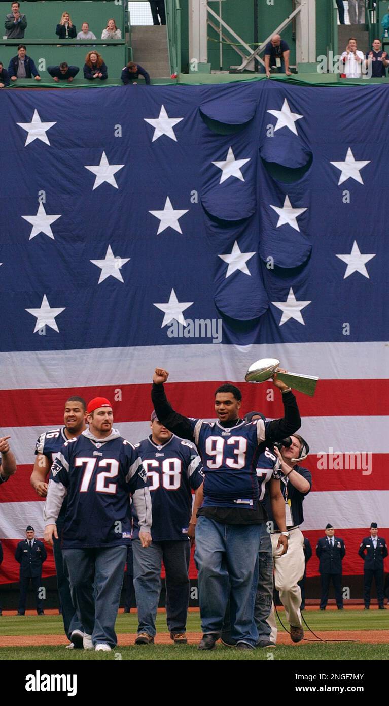 New England Patriots Richard Seymour holds the 2001 Super Bowl trophy ...