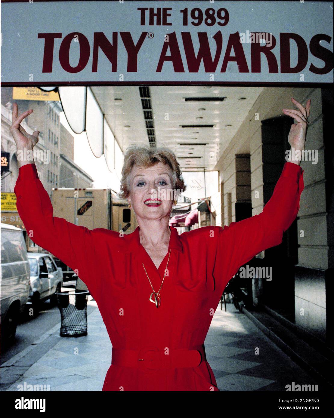 Actress Angela Lansbury poses outside the Lunt-Fontanne Theatre where ...