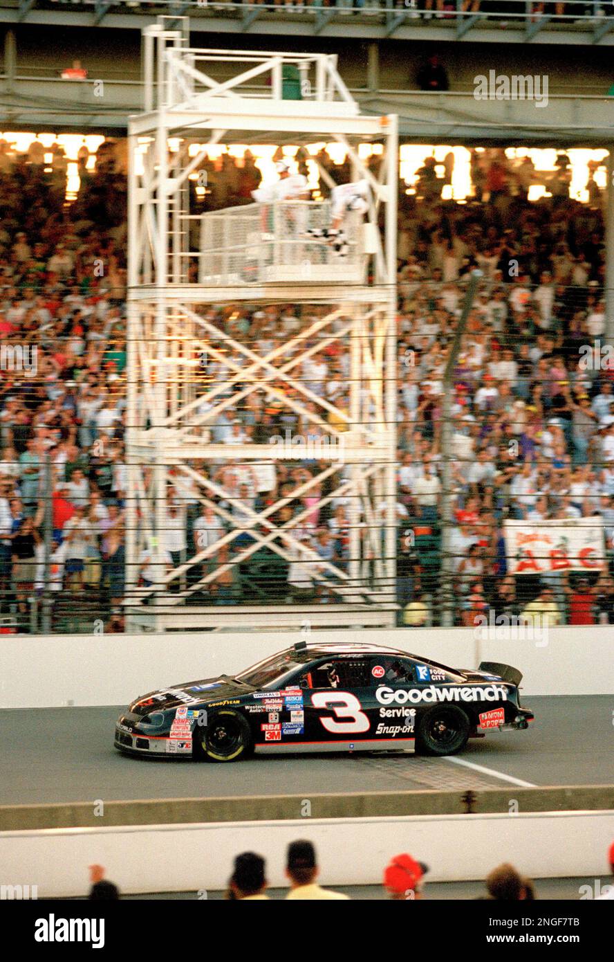 Dale Earnhardt takes the checkered flag to win the Brickyard 400 at ...