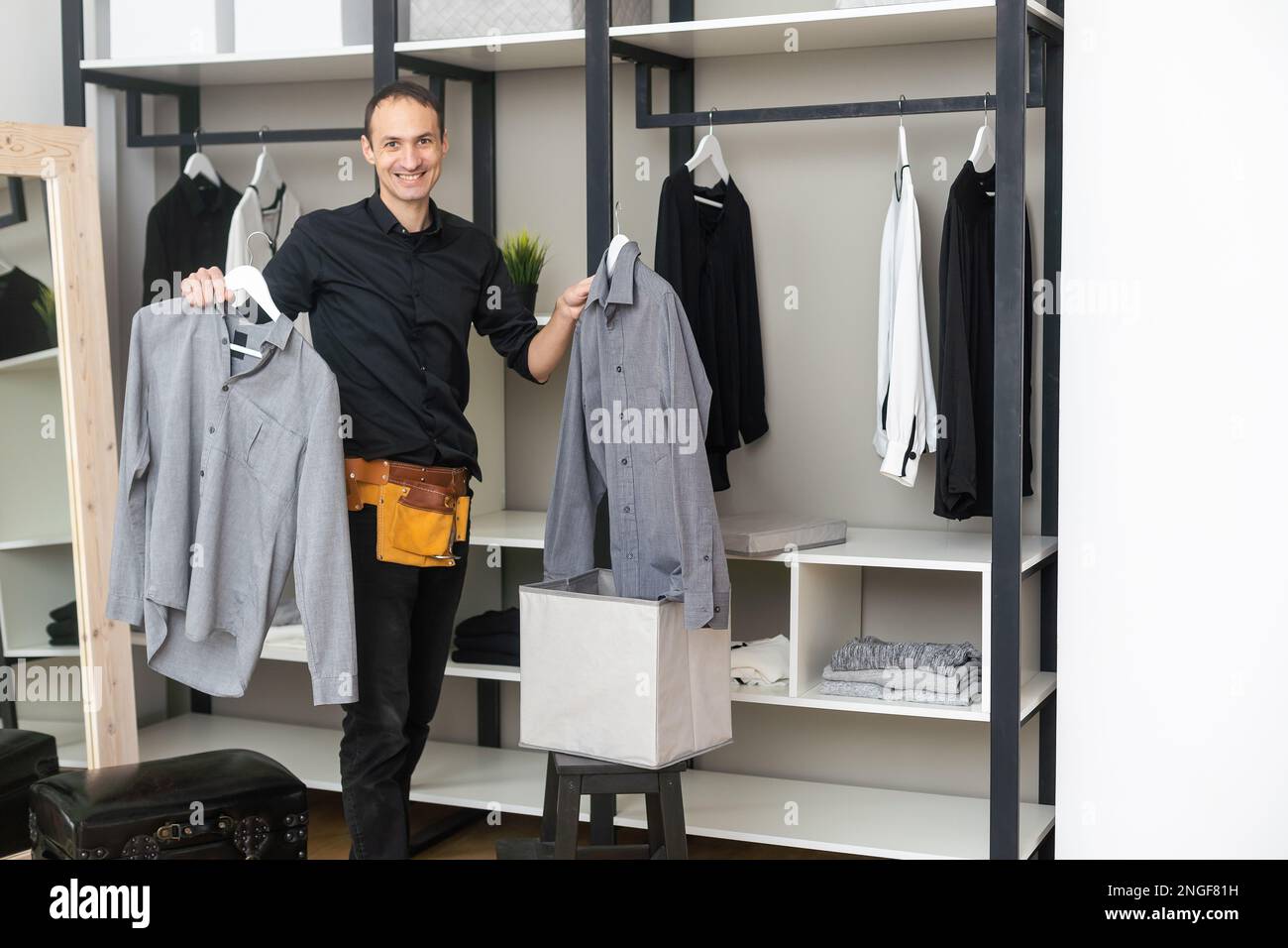 Man delivering laundry hi-res stock photography and images - Alamy