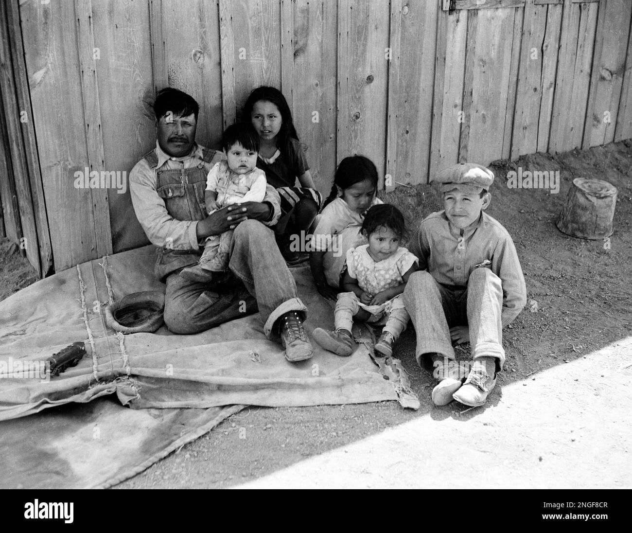 A Mexican migrant worker and his family is shown in this 1936 ...