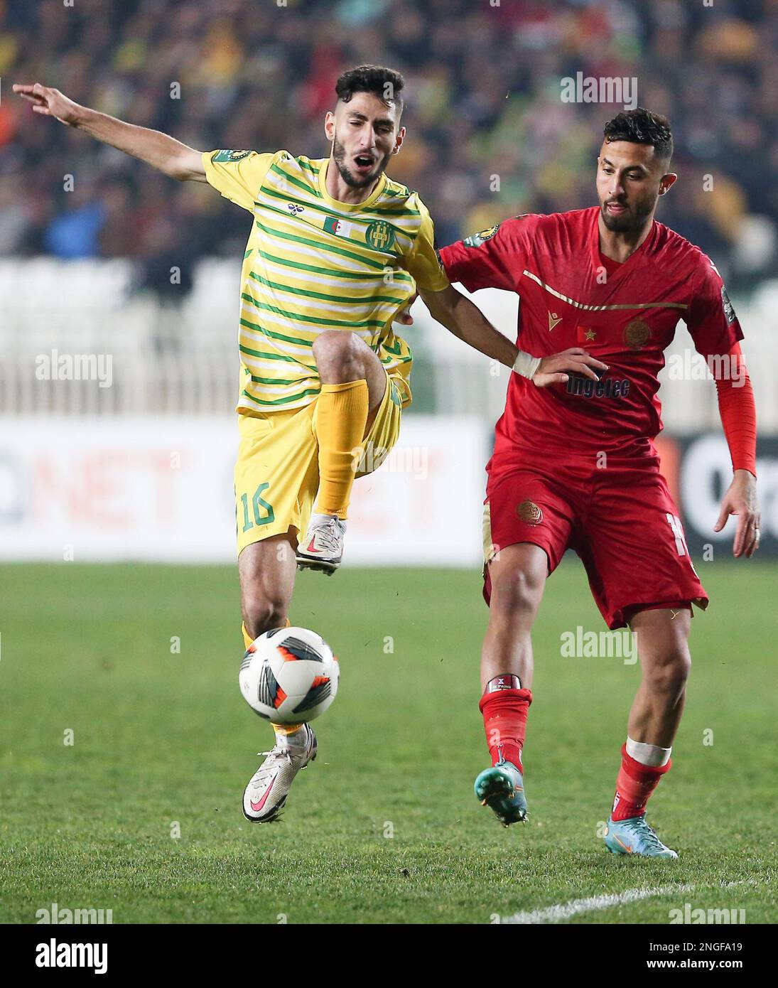 Algiers. 18th Feb, 2023. JS Kabylie's Noufel Ould Hamou (L) vies with ...