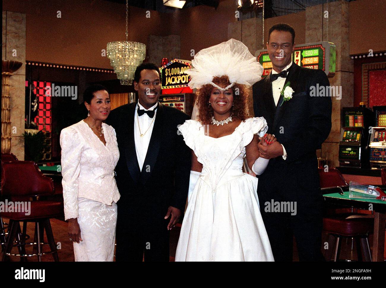 Singer Luther Vandross, second from left, poses with cast members, from ...