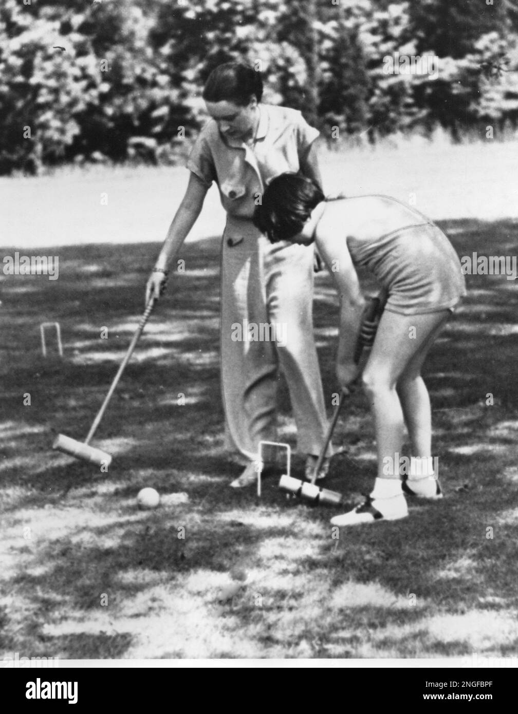 Gloria Morgan Vanderbilt is shown as she plays croquet with her ...
