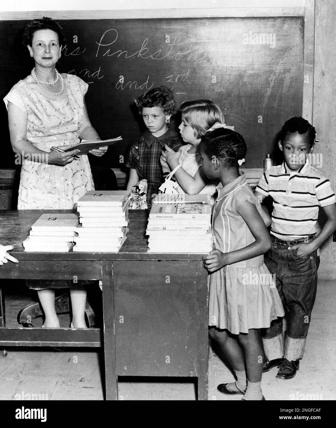 Mrs. Pinkston enrolls 2nd and 3rd graders at the newly integrated ...