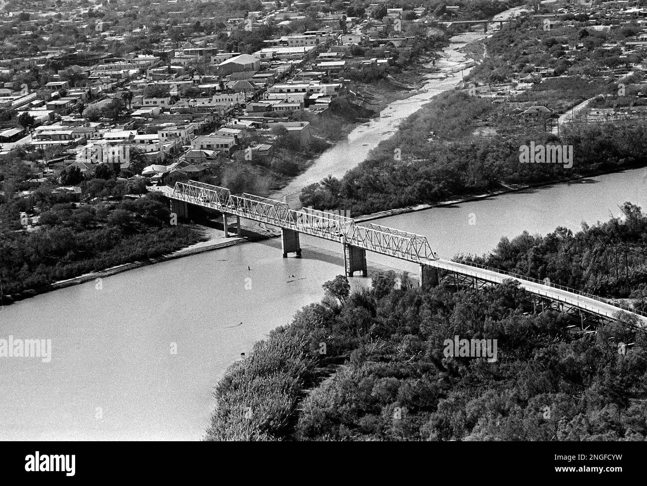This aerial view shows the International Bridge across the Rio Grande ...
