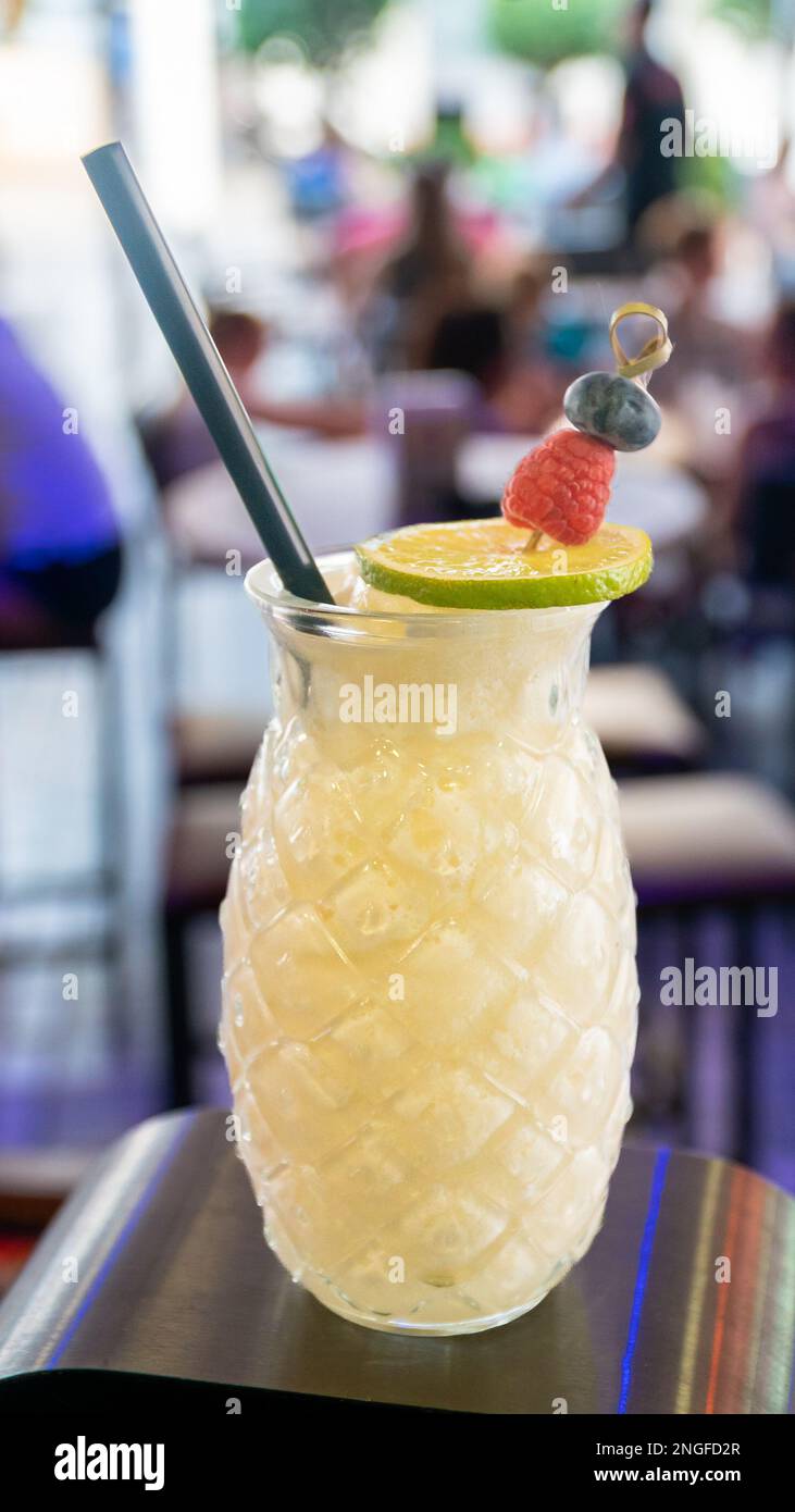 Pina colada alcoholic cocktail served at a bar Stock Photo - Alamy