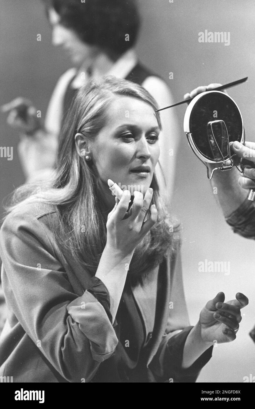 Actress Meryl Streep touches up her lipstick at Vivian Beaumont Theater ...