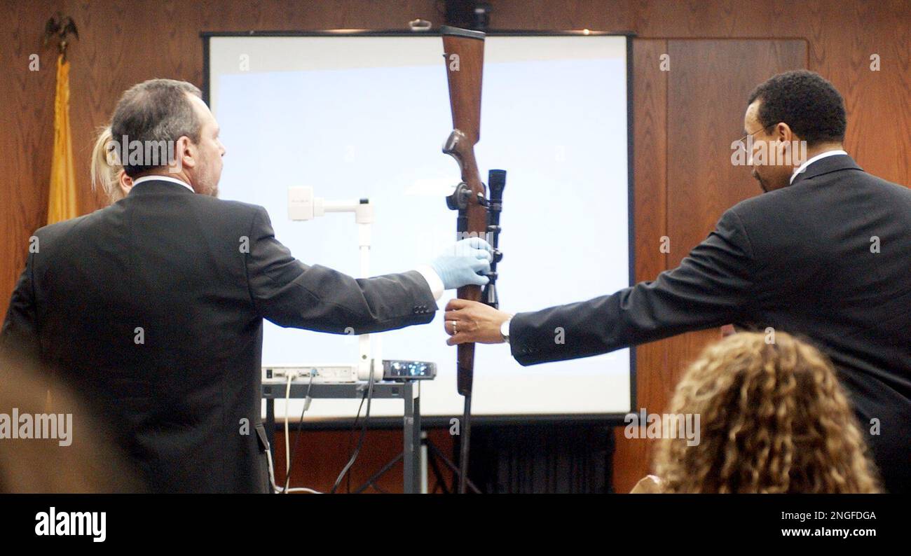 Hunterdon County, N.J., Assistant Prosecutor Steven Lember, left, holds ...