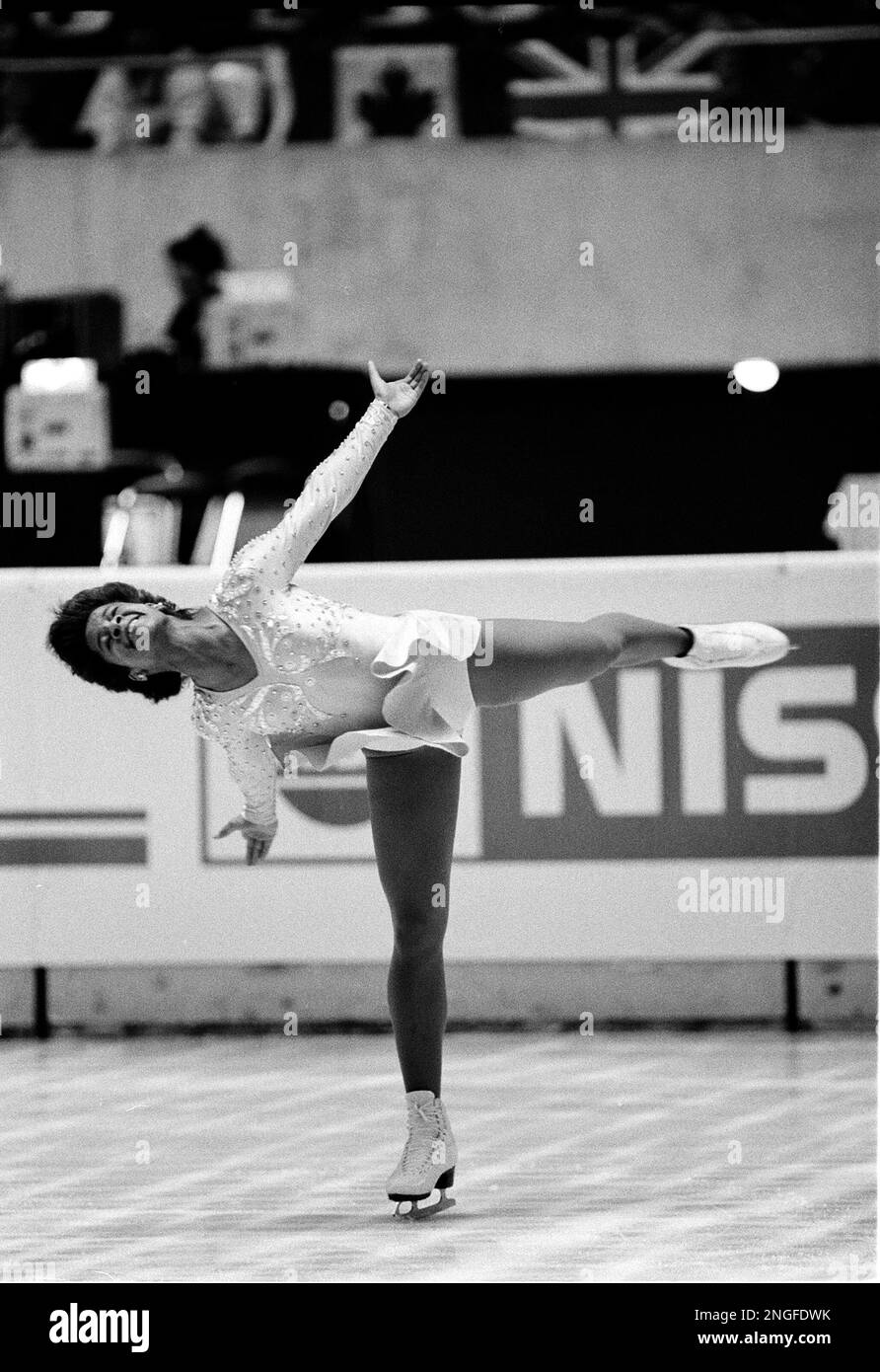 Debi Thomas of the United States spins on the ice during her short ...