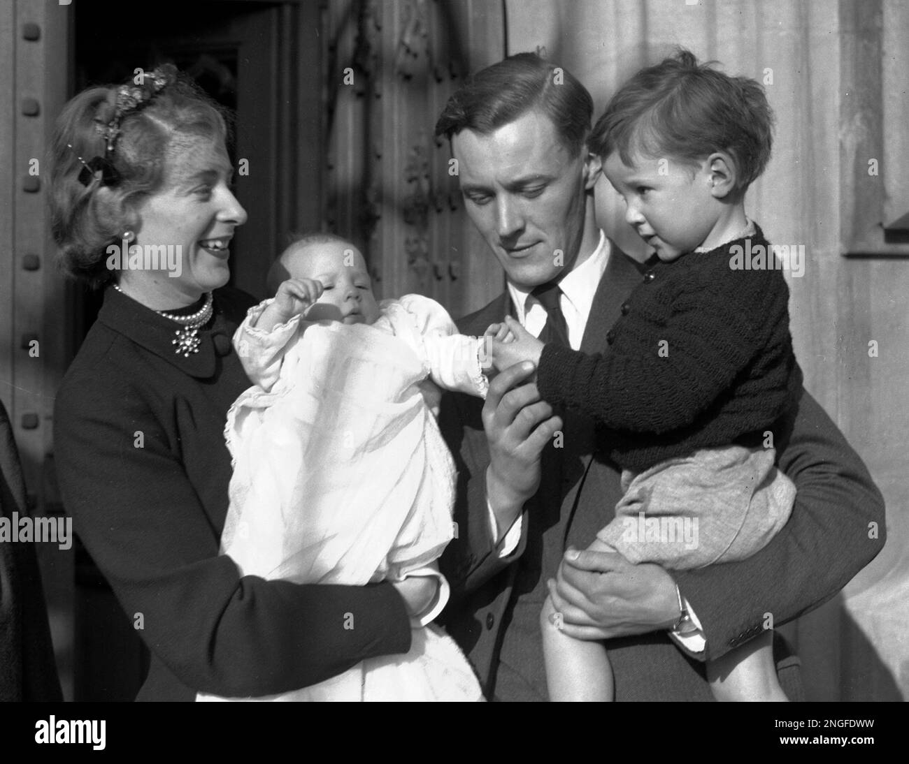 Anthony Wedgwood Benn holds his son Stephen Michael, outside the House ...
