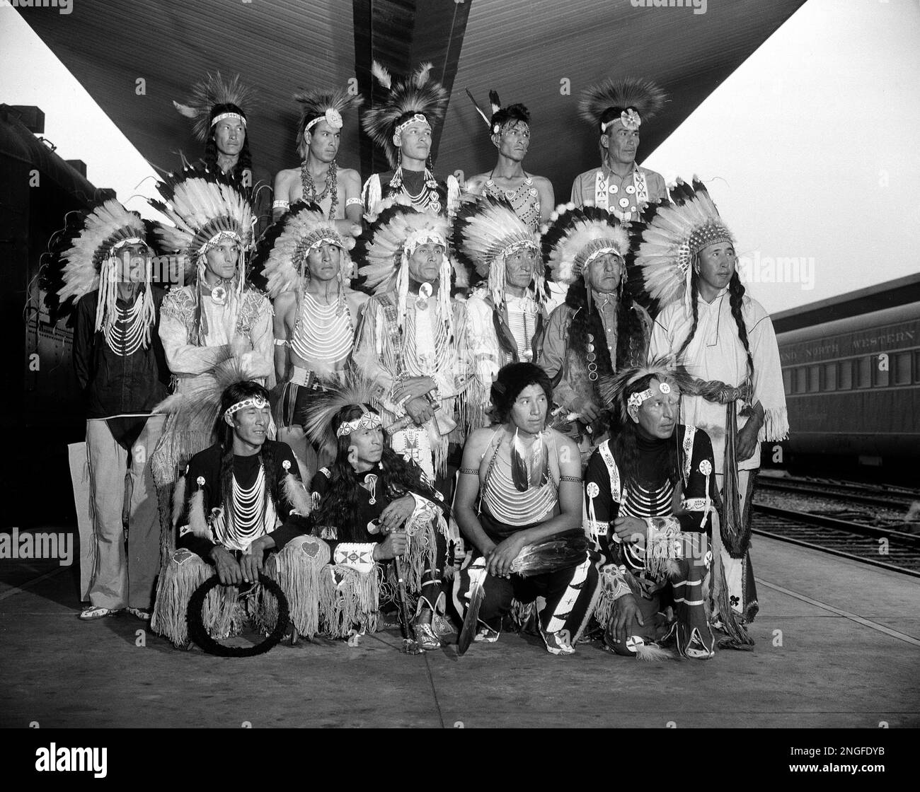 Dressed in their traditional clothes, sixteen men of the Sioux, from ...