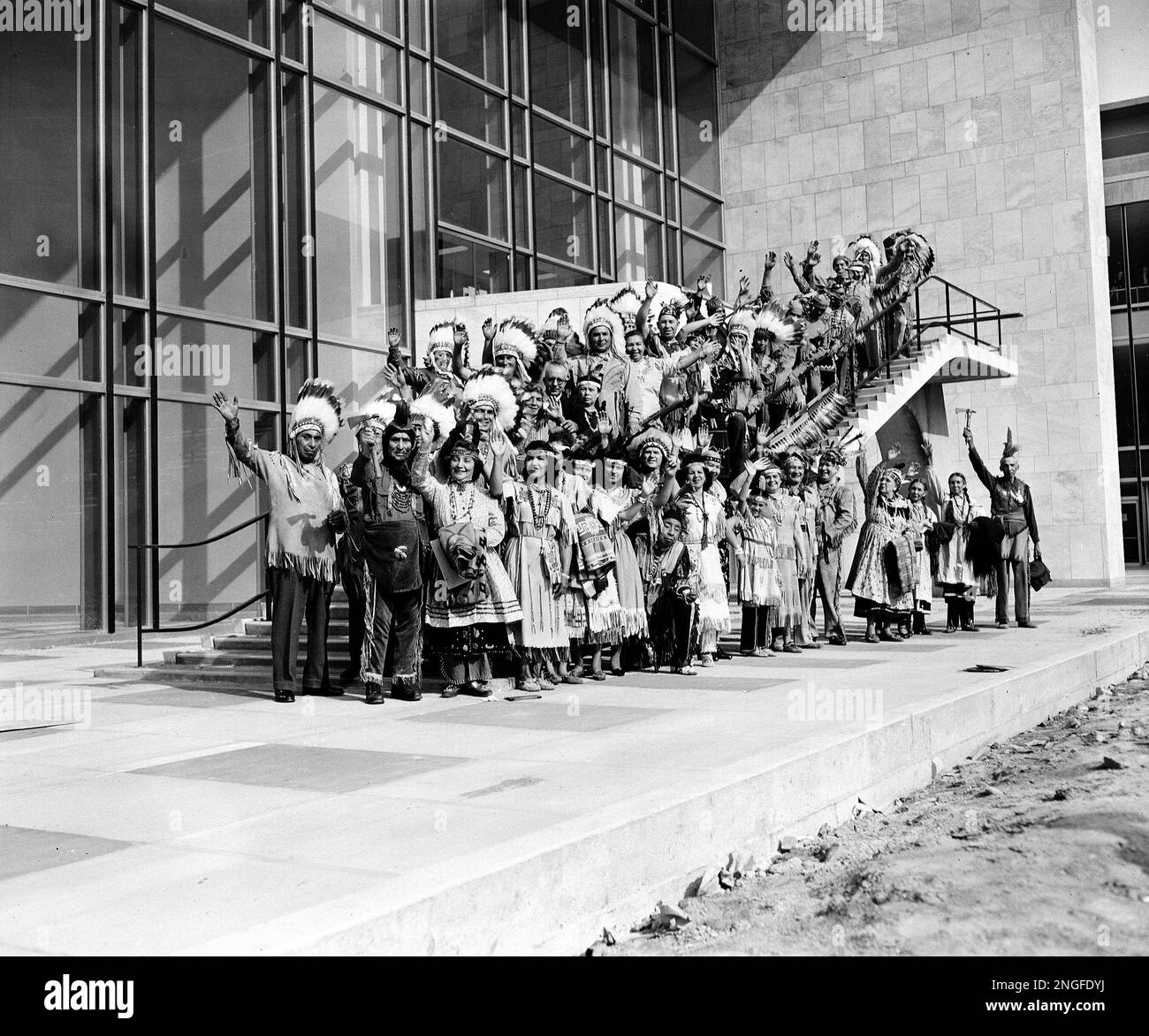 Members of the six-nation Iroquois confederacy wave from the front of ...