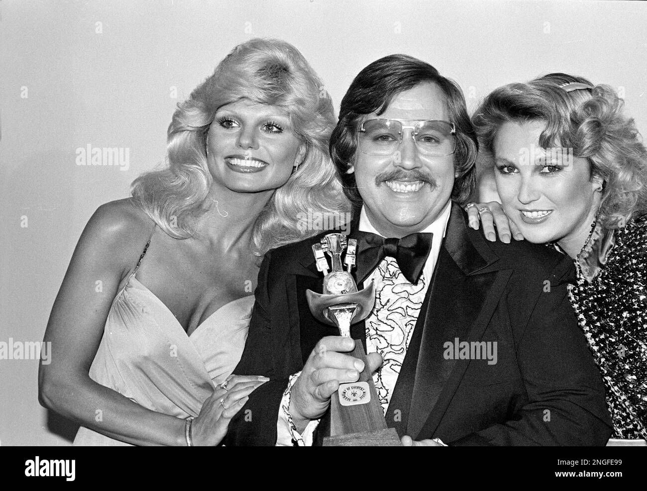 John Conlee holds his award for new male vocalist of the year at the ...