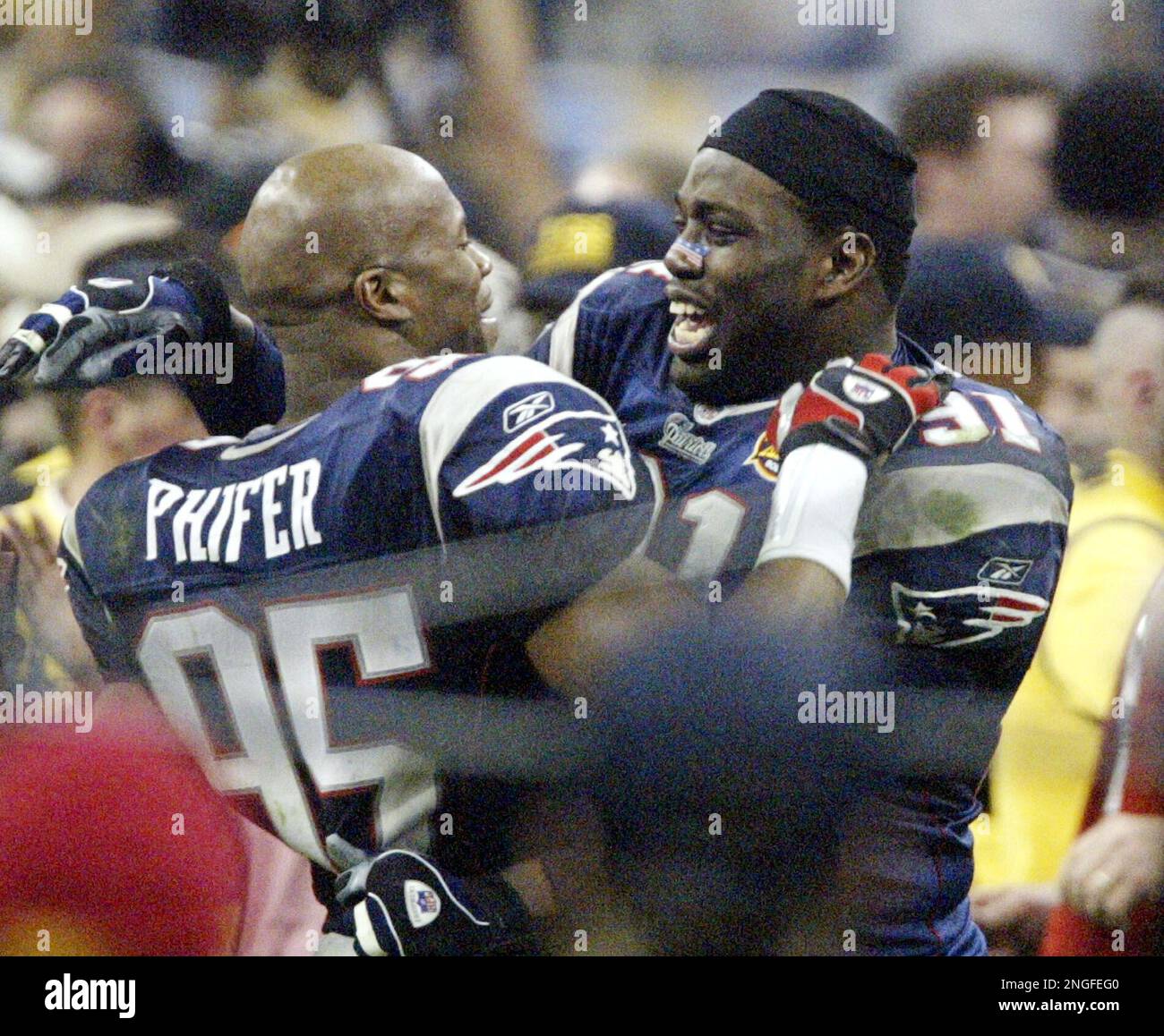 New England Patriots' Roman Phifer (95) and Bobby Hamilton (91 ...