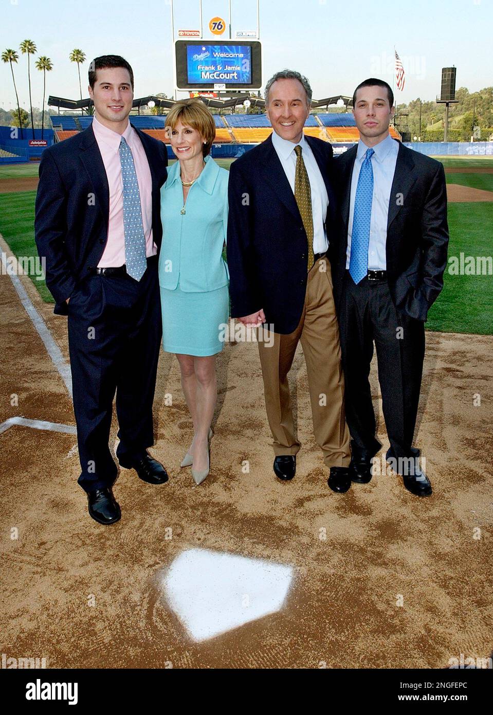 Boston real estate developer Frank McCourt, second from right, his wife ...