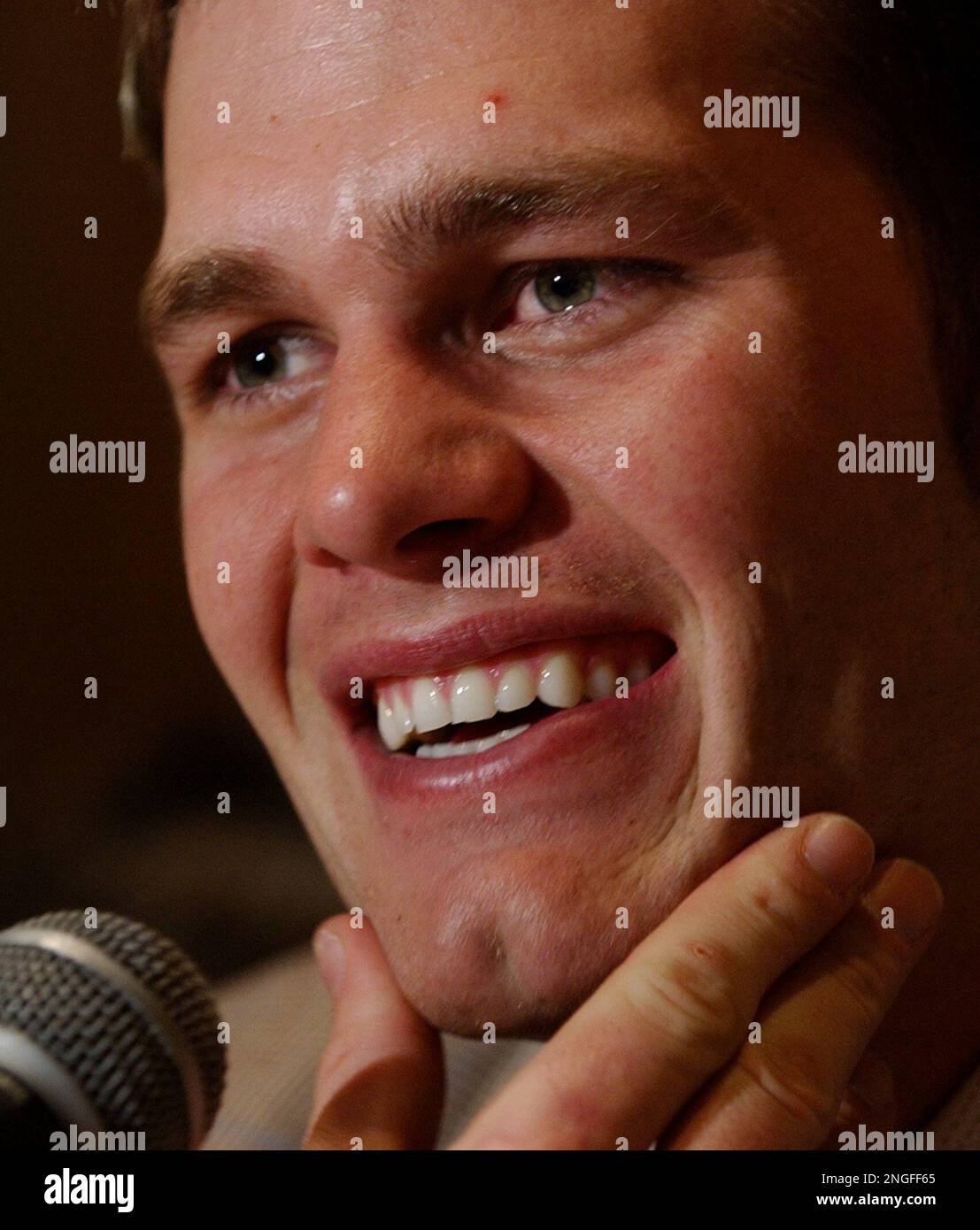 New England Patriots quarterback Tom Brady smiles as he answers ...