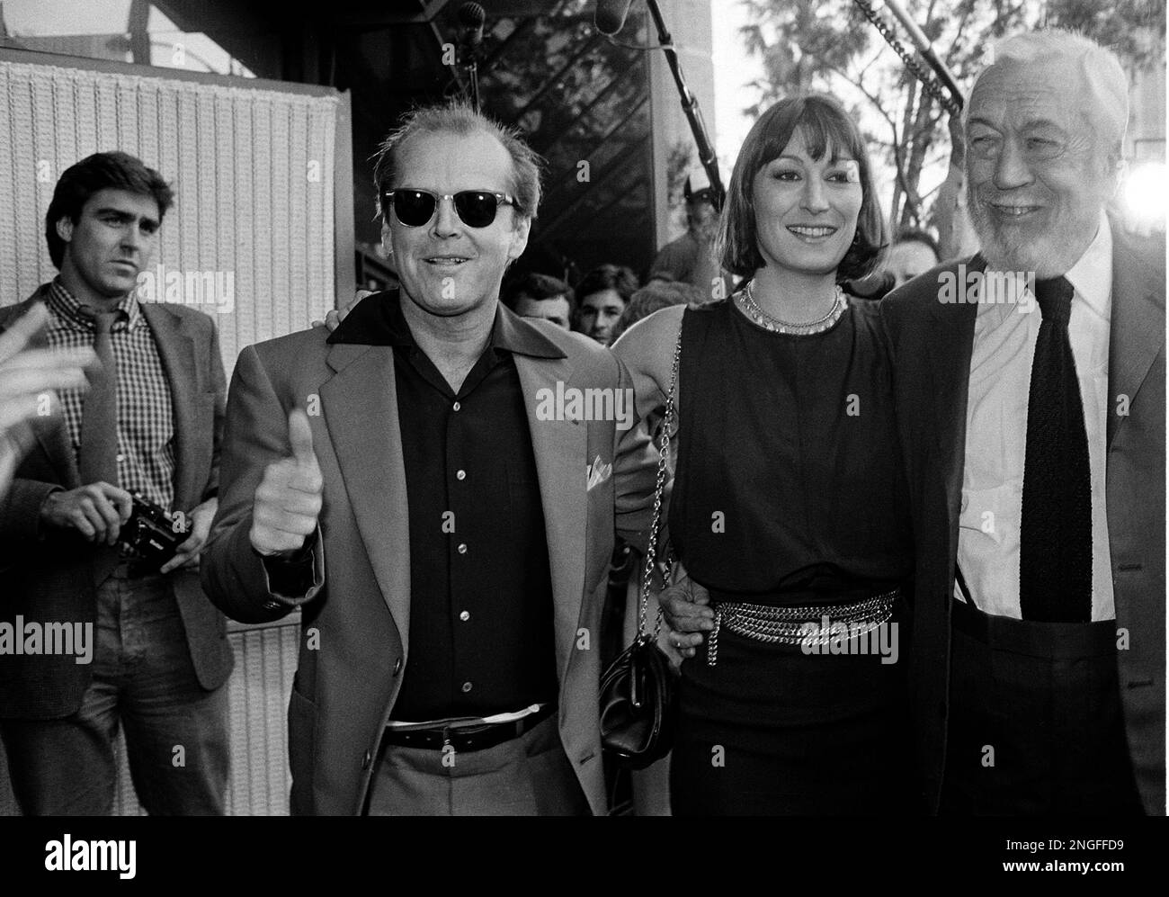 Actor Jack Nicholson gives a thumbs up to the crowd as he arrives for ...