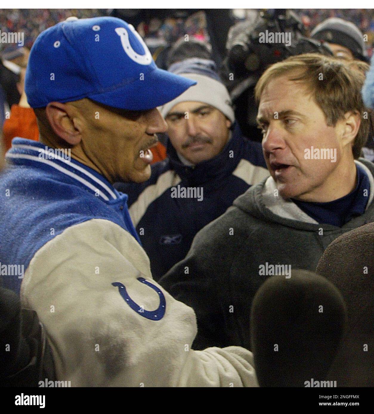 Indianapolis Colts coach Tony Dungy, left, congratulates New England ...