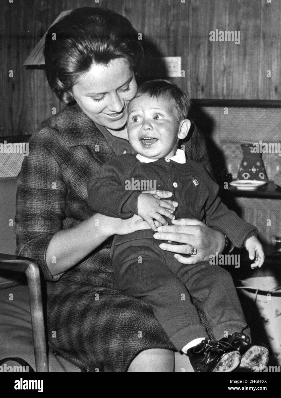 Princess Muna, British-born wife of King Hussein of Jordan, holds their ...