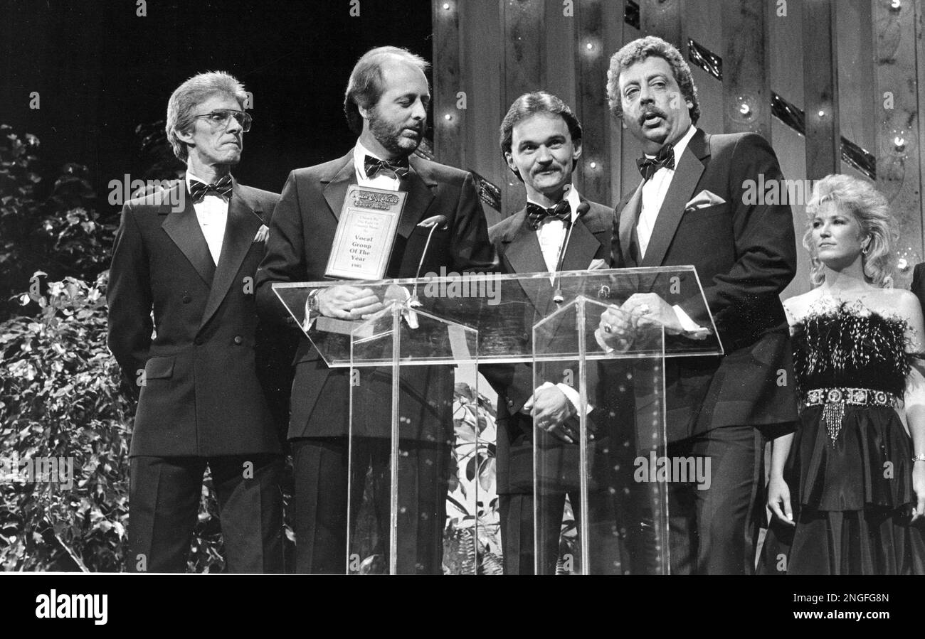 The Statler Brothers, Phil Balsley, Don Reid, Jimmy Fortune, and Harold Reid, from left, accept ...