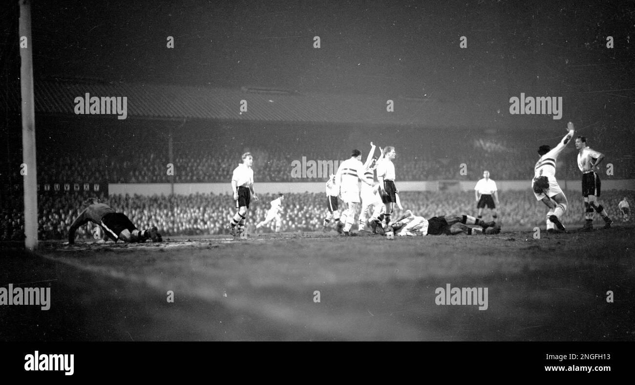 Honved players, in striped shirts, celebrate after Kocsis scored their ...