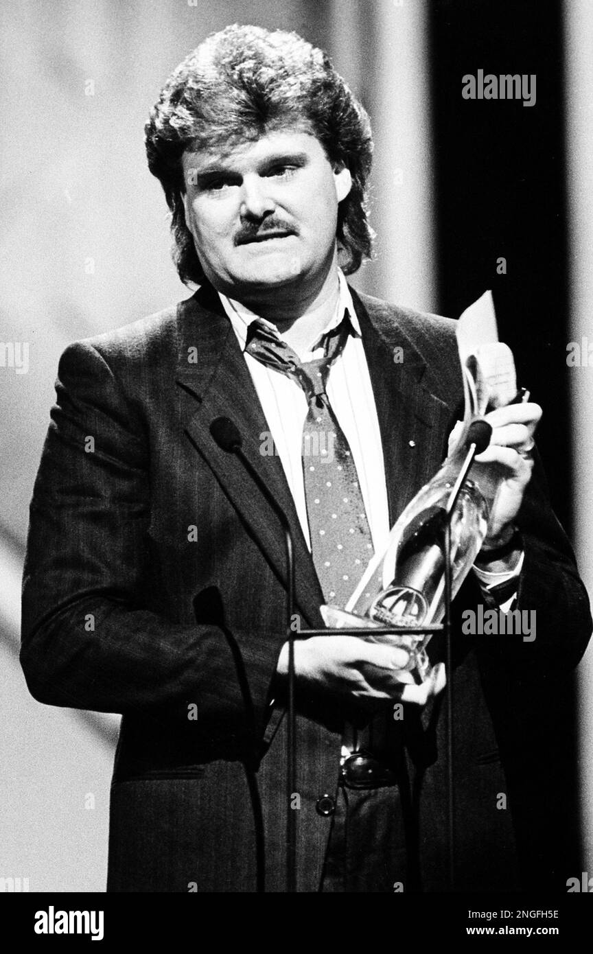 American Country Music singer Ricky Skaggs accepts the Entertainer of ...