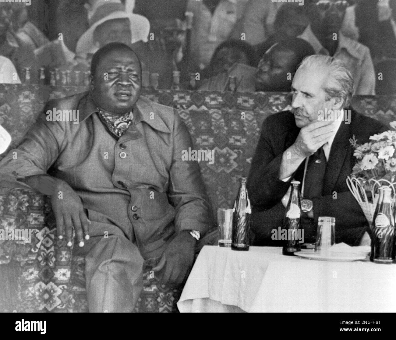 Former Ugandan President Idi Amin, left, is shown with his British aide ...
