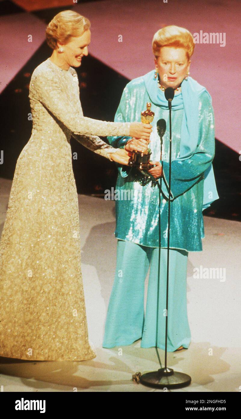 Actress Glenn Close, left, hands an honorary award to Hollywood screen ...