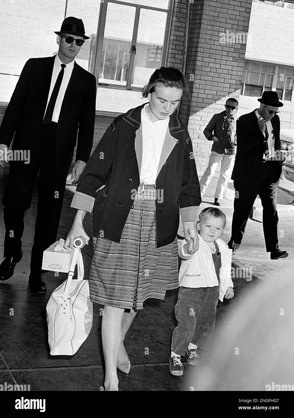 Marina Oswald, wife of Lee Harvey Oswald, arrives with her daughter ...