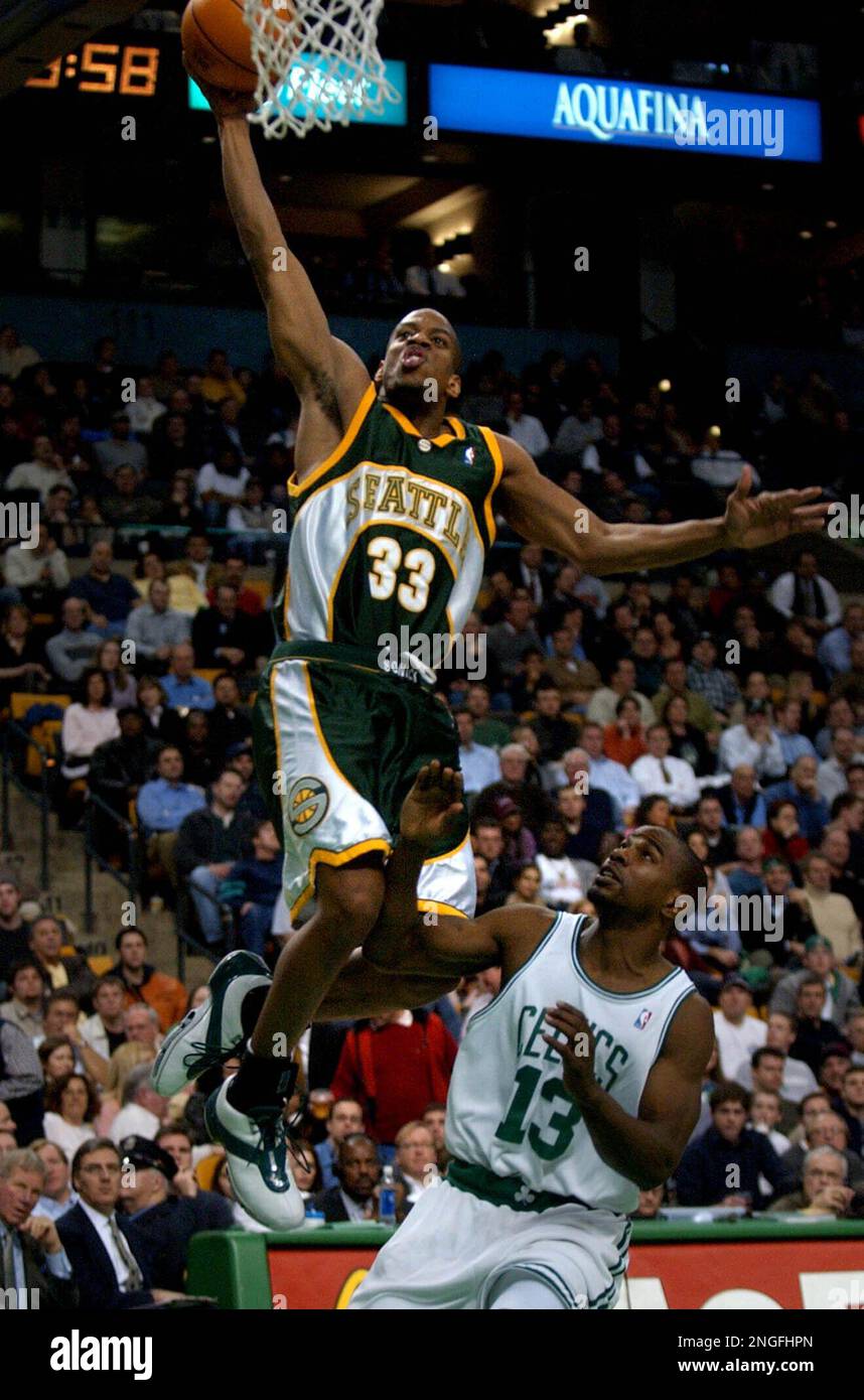 Seattle Super Sonics guard Antoino Daniels (33) glides in for a slam ...