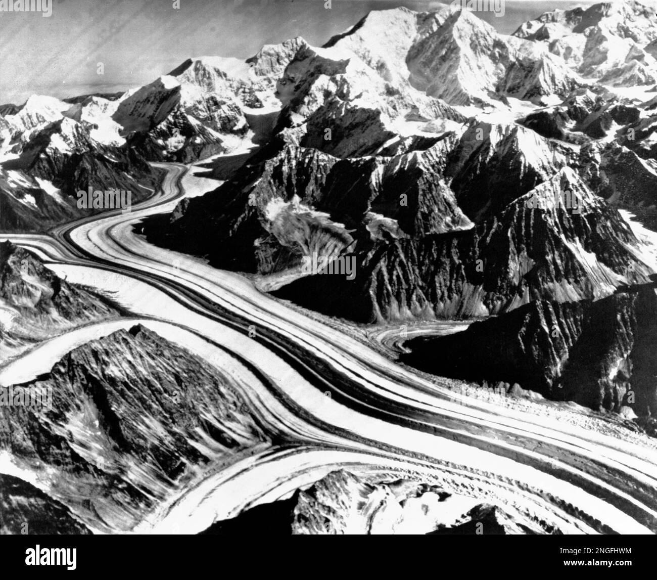 The Yentna Glacier in south-central Alaska, June 12, 1970. Dark areas ...