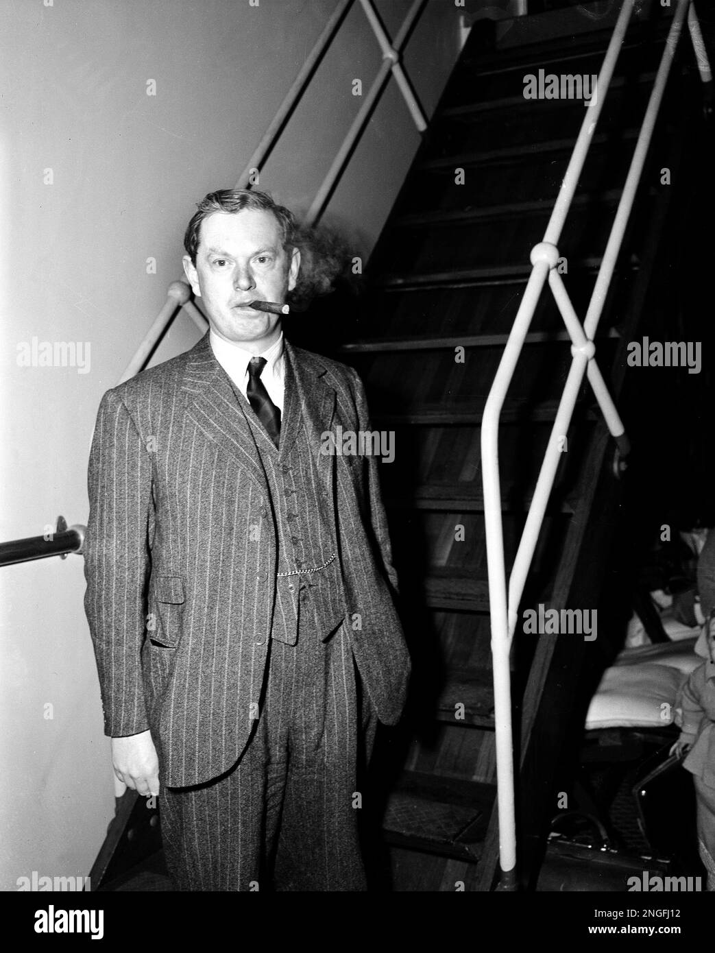 British novelist and writer Evelyn Arthur St. John Waugh is seen aboard ...