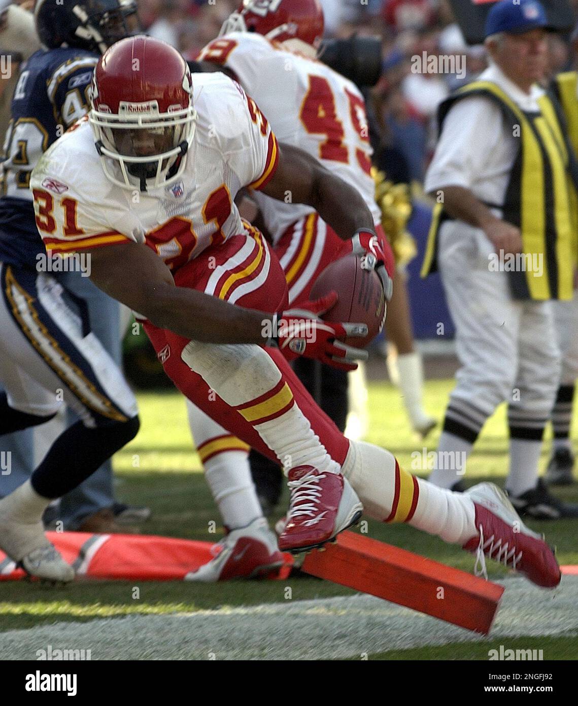 Kansas City Chiefs running back Priest Holmes slides into the endzone ...