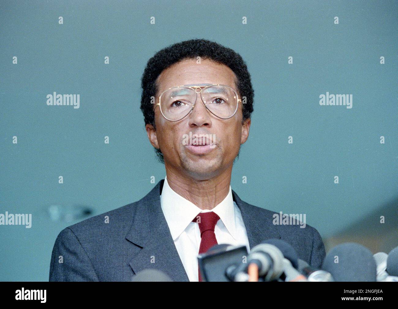 Former tennis star Arthur Ashe calls a news conference and announces he ...