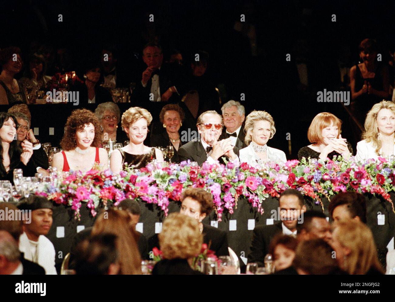 Actor Jack Nicholson, center, is seated among Hollywood actresses ...