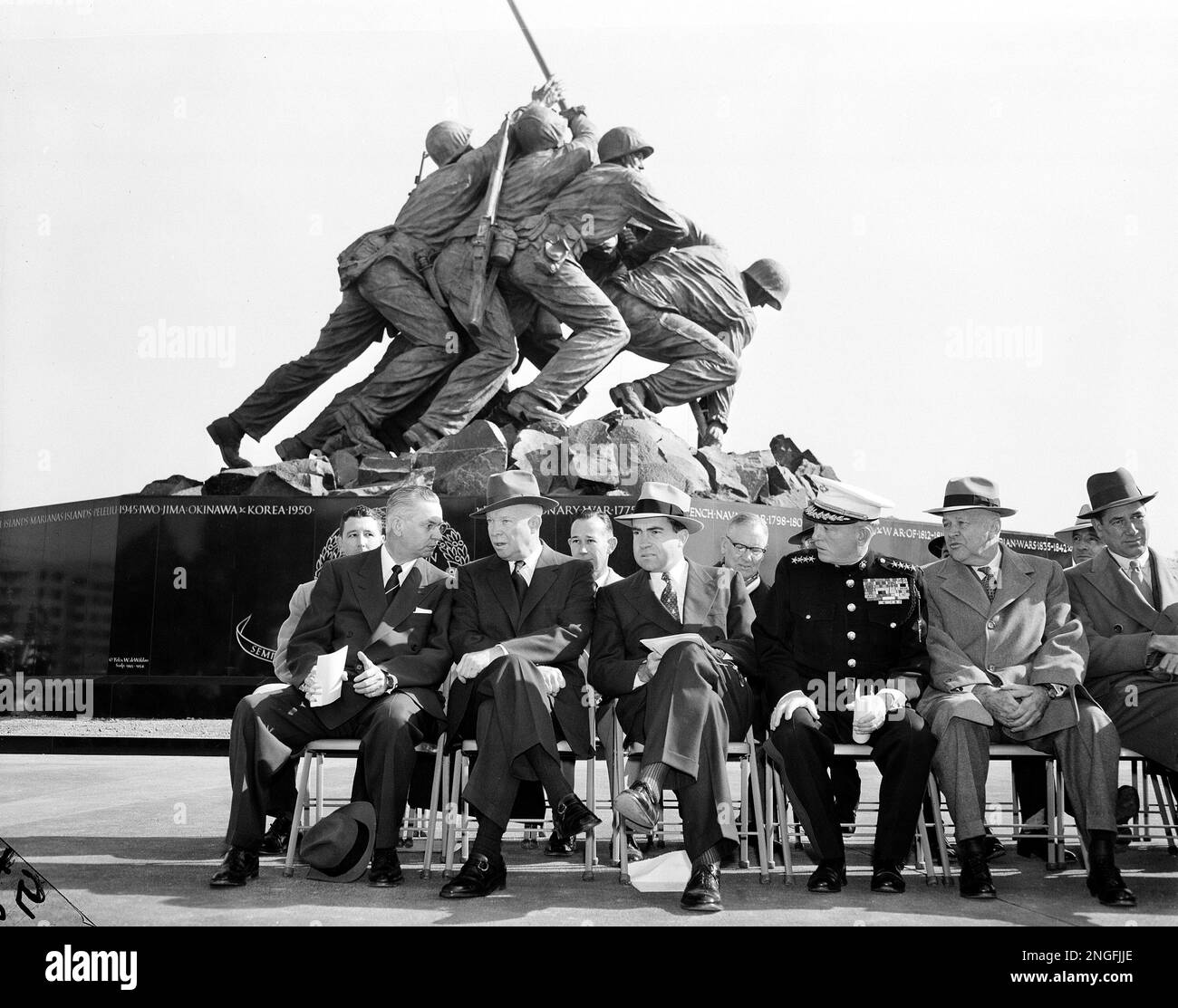 U.S. President Dwight Eisenhower, second from left, talks with Deputy ...