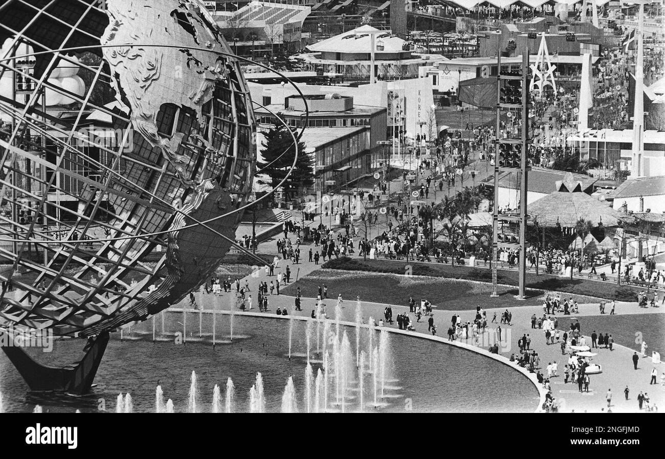 Visitors attend the New York World's Fair on the first Sunday the fair ...